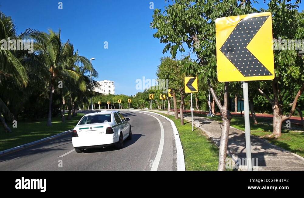 Road signs warning drivers about dangerous curve Stock Video Footage ...