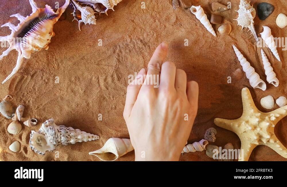 Hand drawing Number Six 6 symbol in the sand. Beach background. Top ...