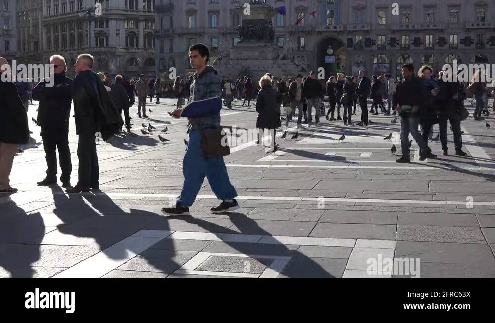 4K Crowded Duomo Square Milan downtown pedestrian people relax iconic ...