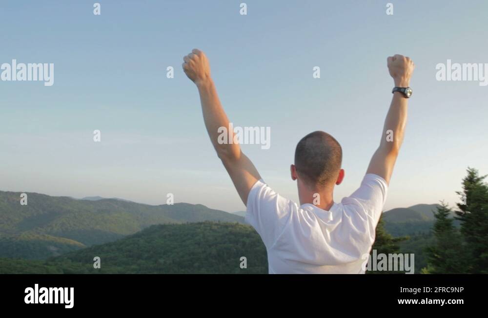 Arms up mountain Stock Videos & Footage - HD and 4K Video Clips - Alamy