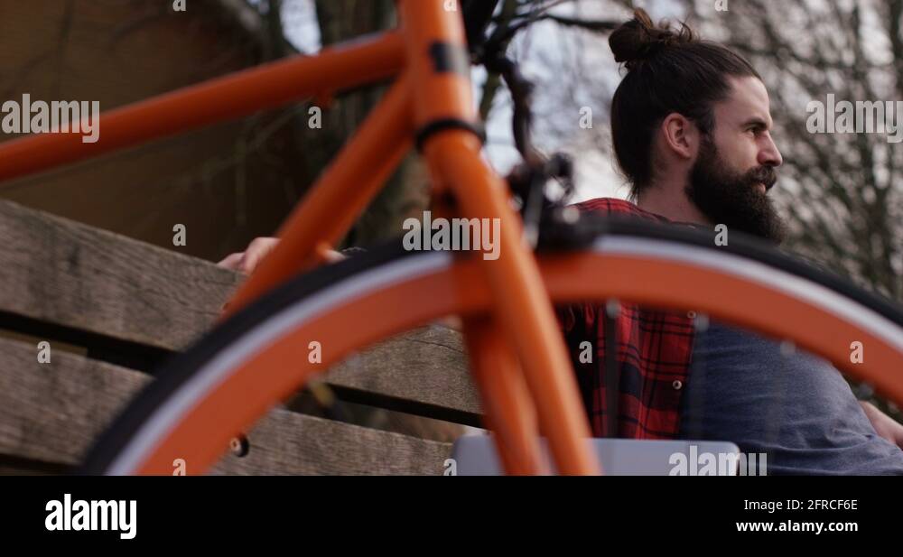 Sitting on a cycle Stock Videos & Footage - HD and 4K Video Clips - Alamy
