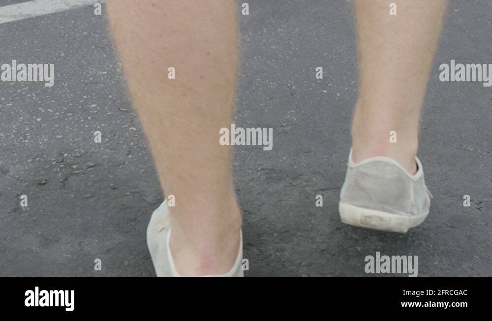 Walking on asphalt Stock Videos & Footage - HD and 4K Video Clips - Alamy