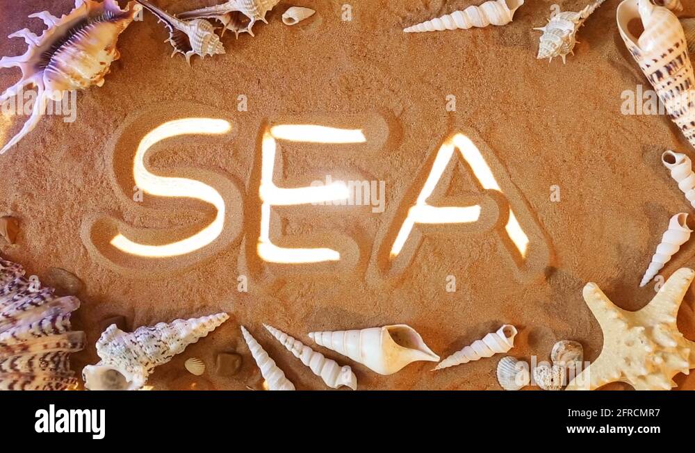 Hand drawing Sea symbol in the sand. Beach background. Top view Stock ...