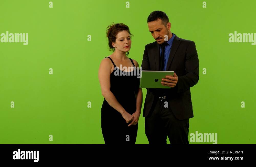 man&woman slide ipad greenscreen ms 4K Stock Video Footage - Alamy