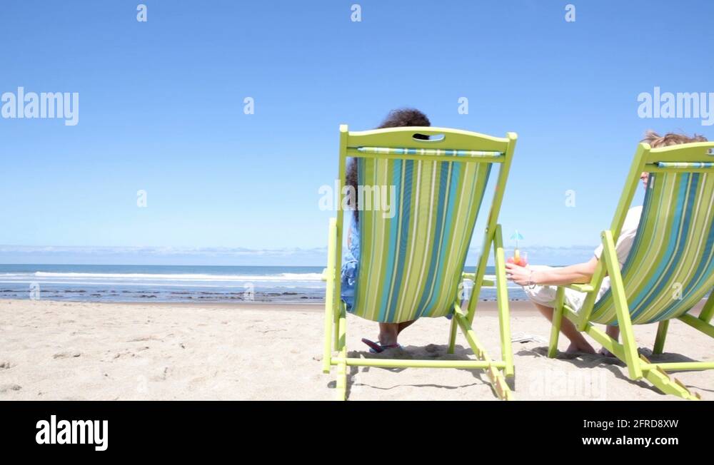 Sitting in beach chairs Stock Videos & Footage - HD and 4K Video Clips ...
