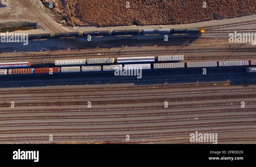 Looking down on railroad rail yard, many trains, tracks Stock Video ...