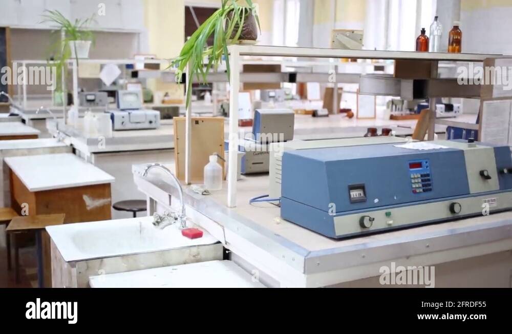 Different devices on tables in empty chemical laboratory Stock Video ...