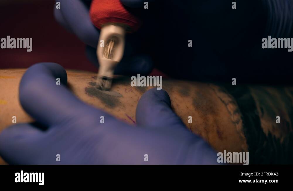 Close up tattoo master making Stock Videos & Footage - HD and 4K Video ...