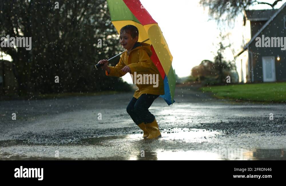 Boy jumping in puddles Stock Videos & Footage - HD and 4K Video Clips ...