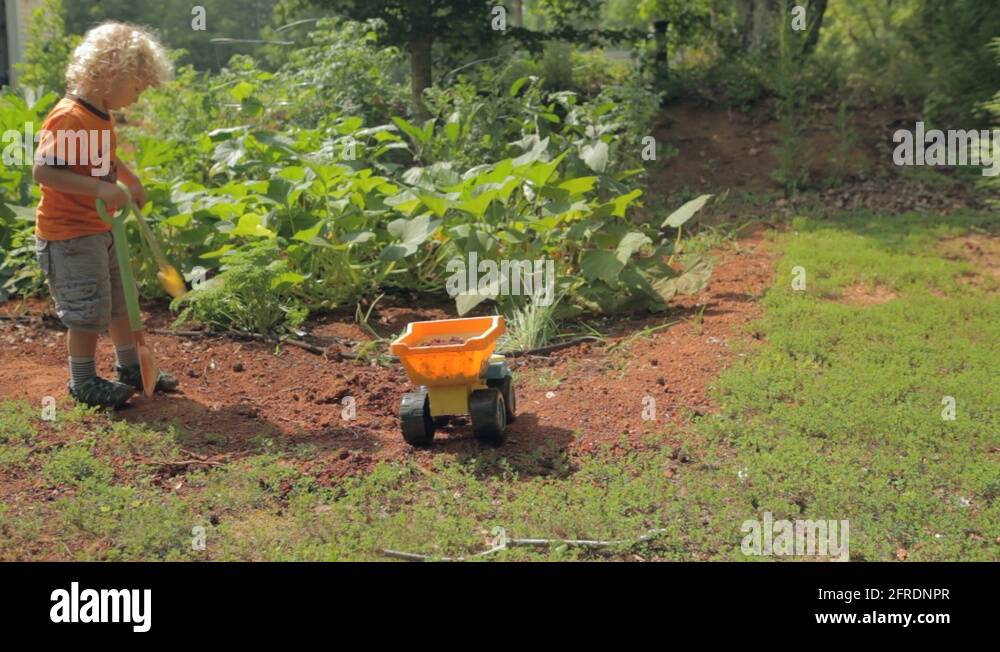 Kid digging in garden Stock Videos & Footage - HD and 4K Video Clips ...