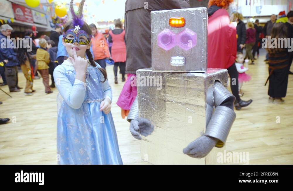 Robot costume and princess posing to camera 4K Stock Video Footage - Alamy