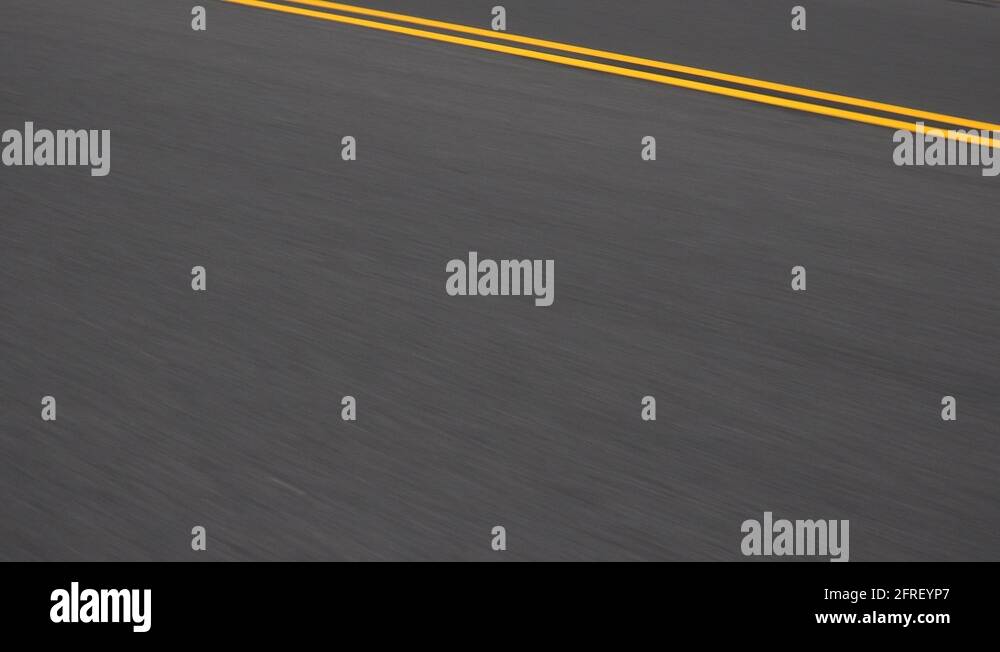 Double_yellow_lines Stock Videos & Footage - HD and 4K Video Clips - Alamy