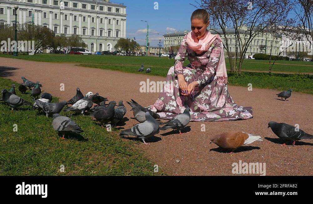 Girl and doves Stock Videos & Footage - HD and 4K Video Clips - Alamy