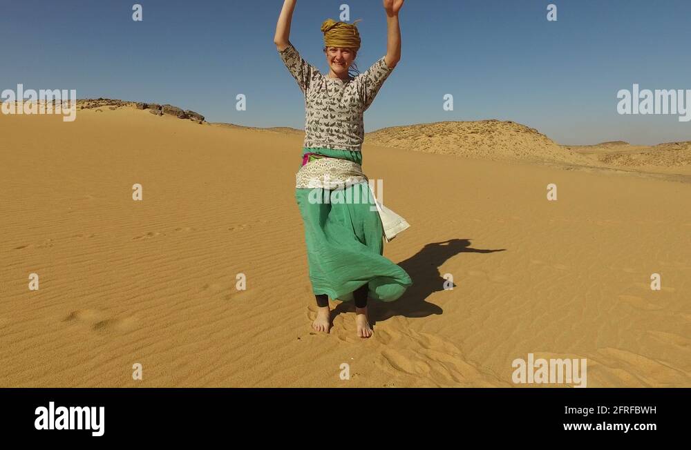 Happy barefoot young woman dancing Stock Videos & Footage - HD and 4K ...