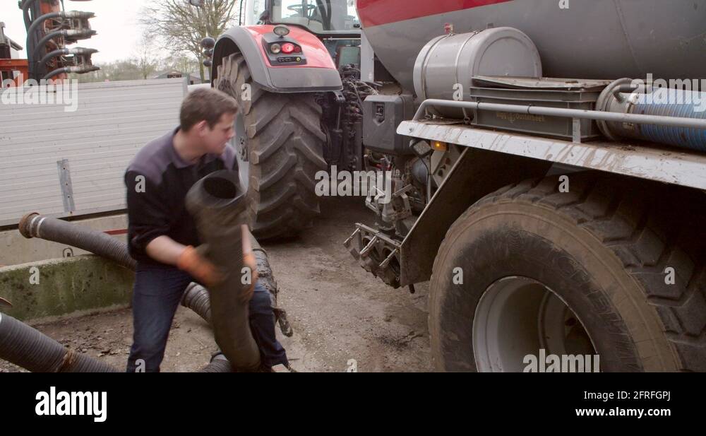 hose coupling, loading manure into the tank of a liquid manure trailer ...