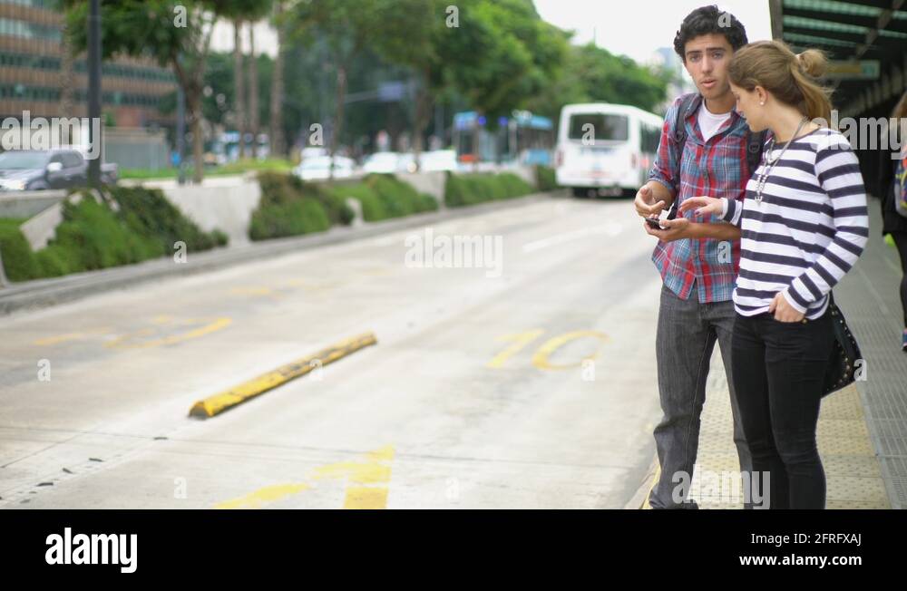 Two people waiting bus Stock Videos & Footage - HD and 4K Video Clips ...