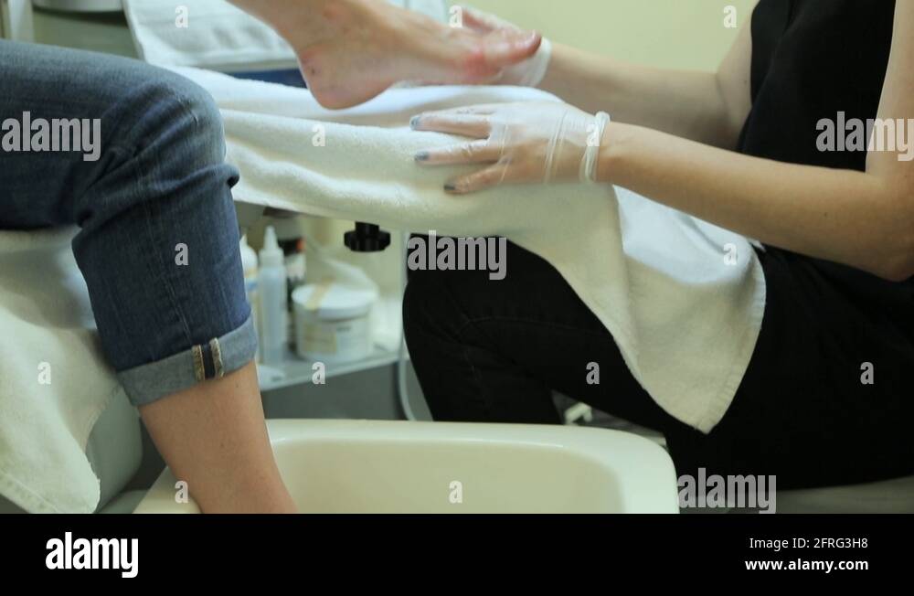 Girl washing legs in the beauty salon Stock Video Footage - Alamy