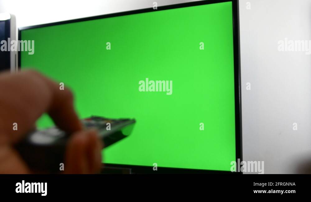 Man Changing Channels On His TV, Green Screen Side Shot Stock Video ...