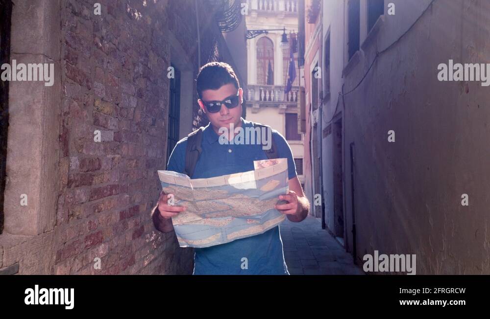 Man looking for Direction Map City Travel Adventure Backpacker ...