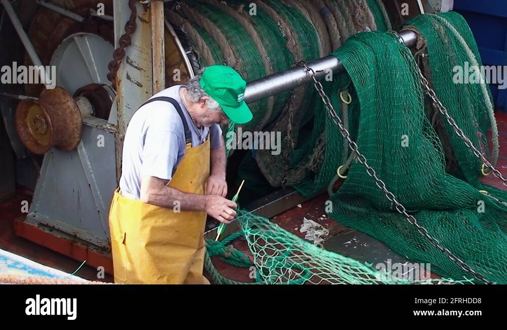 Fisherman mending nets on boat Stock Videos & Footage - HD and 4K Video ...