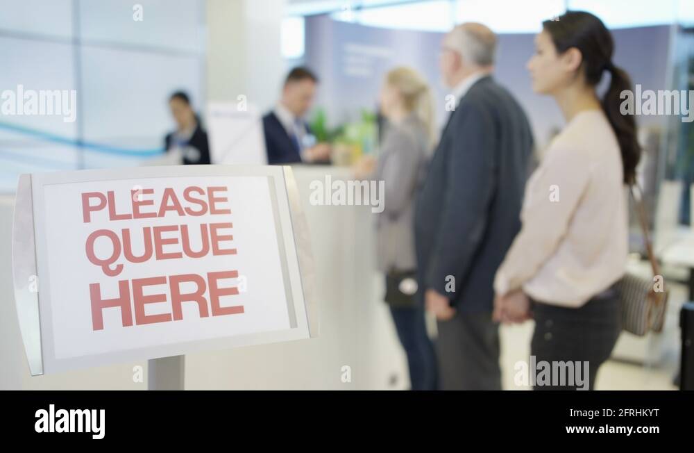 Queuing here sign Stock Videos & Footage - HD and 4K Video Clips - Alamy