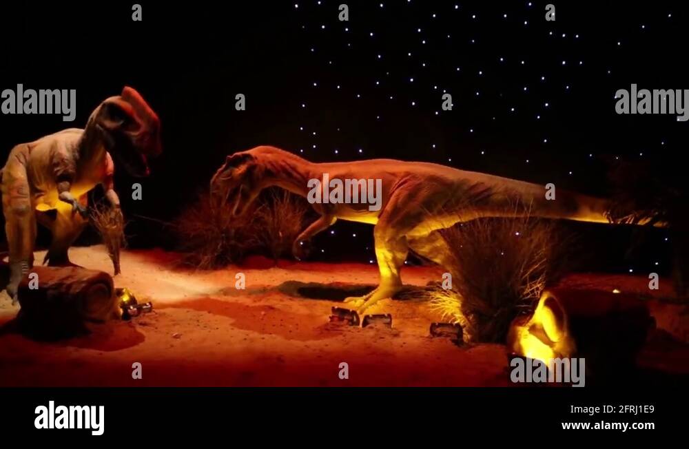 Two robotic dinosaurs at Show of dinosaurs in pavillion of VDNKH Stock ...