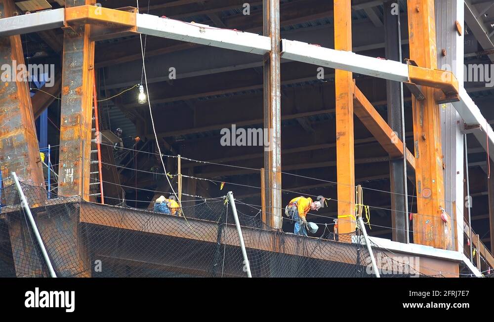 Welding at the construction of a skyscraper by the Hudson Yards Project ...