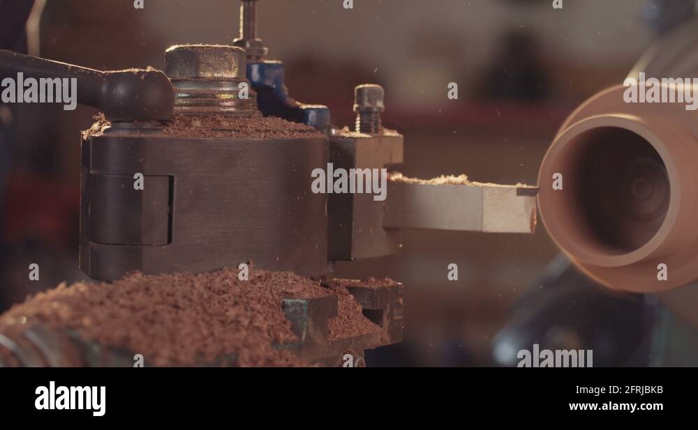 Processing of a wood cylinder on a lathe Stock Video Footage - Alamy