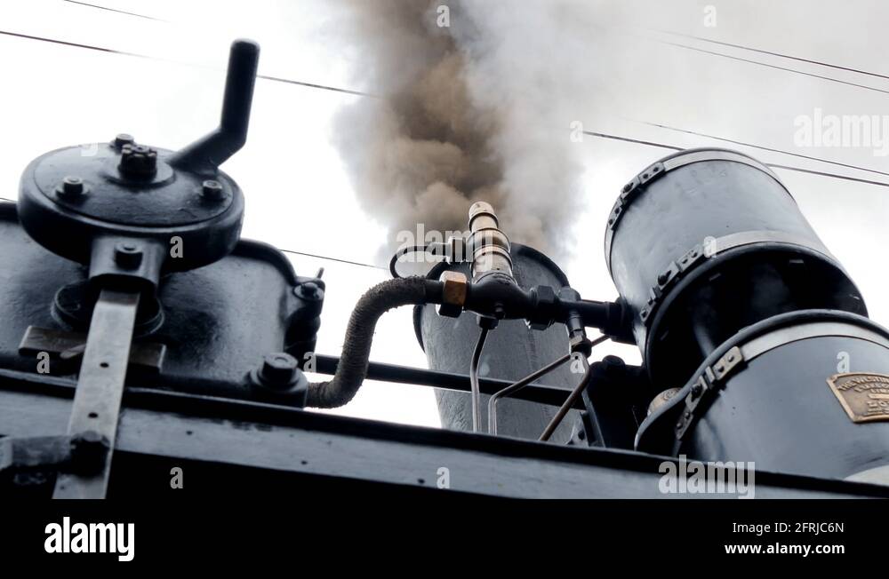 industrial steam engine locomotive. black steel metal background Stock ...