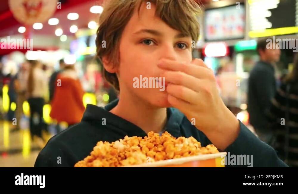 Movie theater popcorn in bucket Stock Videos & Footage - HD and 4K ...