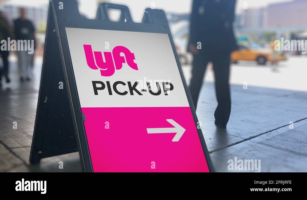 Lyft Ride Sharing Pickup Location Directional Sign Stock Video Footage ...