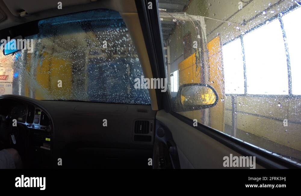 An interior of car being cleaned in a car wash Stock Video Footage - Alamy