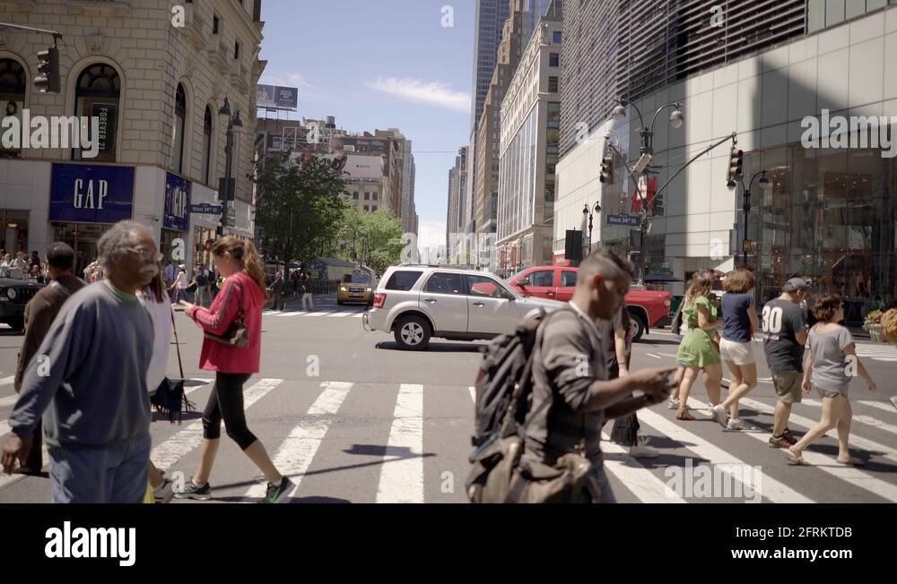 people commuting in new york city on crowded streets. urban lifestyle ...