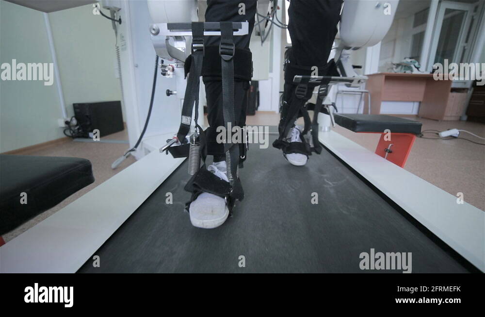 Man with innovative robotic VR cybernetic system walking like a robot ...