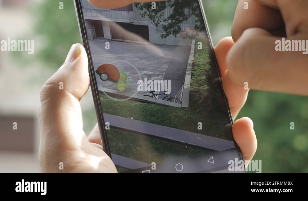 Catching pokemon Stock Videos & Footage - HD and 4K Video Clips - Alamy