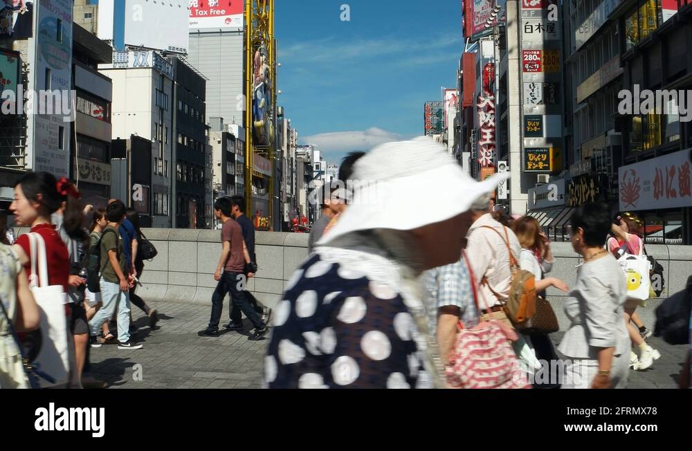 Osaka - People walking on Ebisu Bridge. Dotonbori. 4K resolution Stock ...