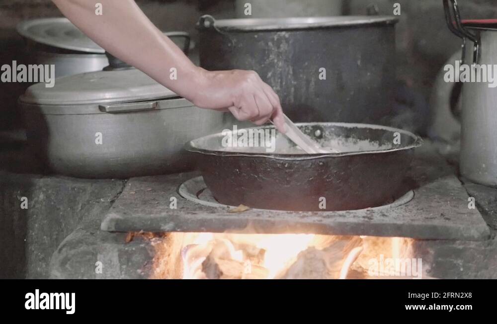 Cooking with firewood Stock Videos & Footage - HD and 4K Video Clips ...