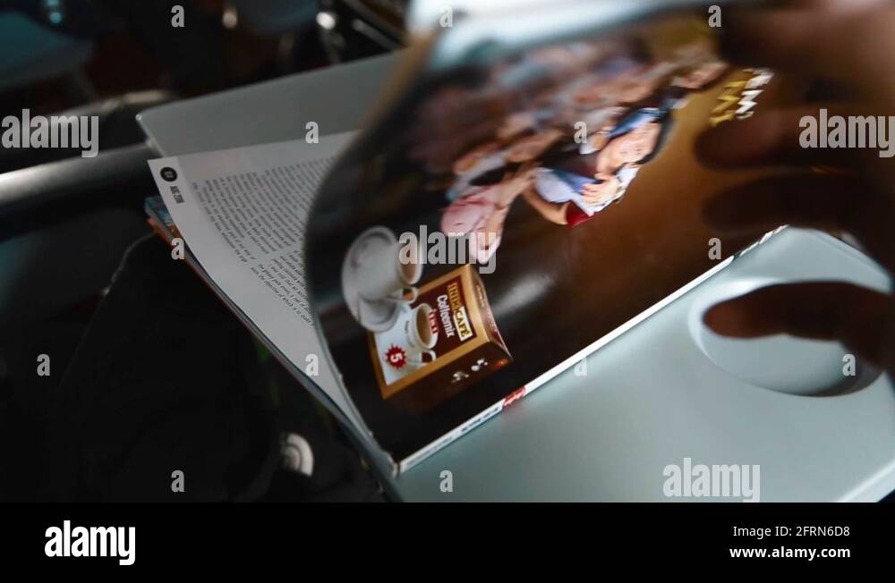 Magazine hand Stock Videos & Footage - HD and 4K Video Clips - Alamy