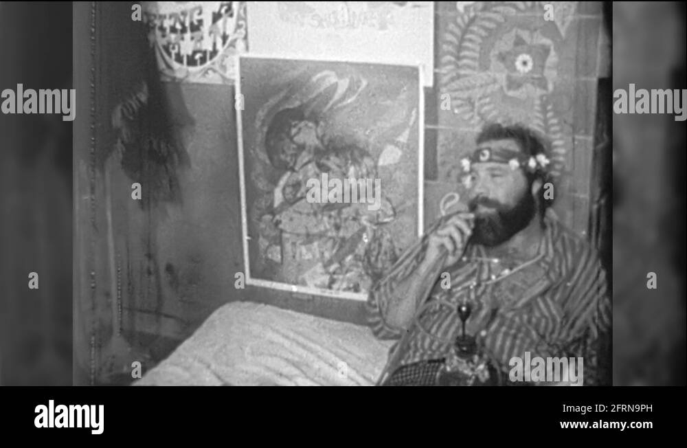 Hippie Man Smokes Weed Dope Marijuana Grass 1960s Vintage Film Home ...