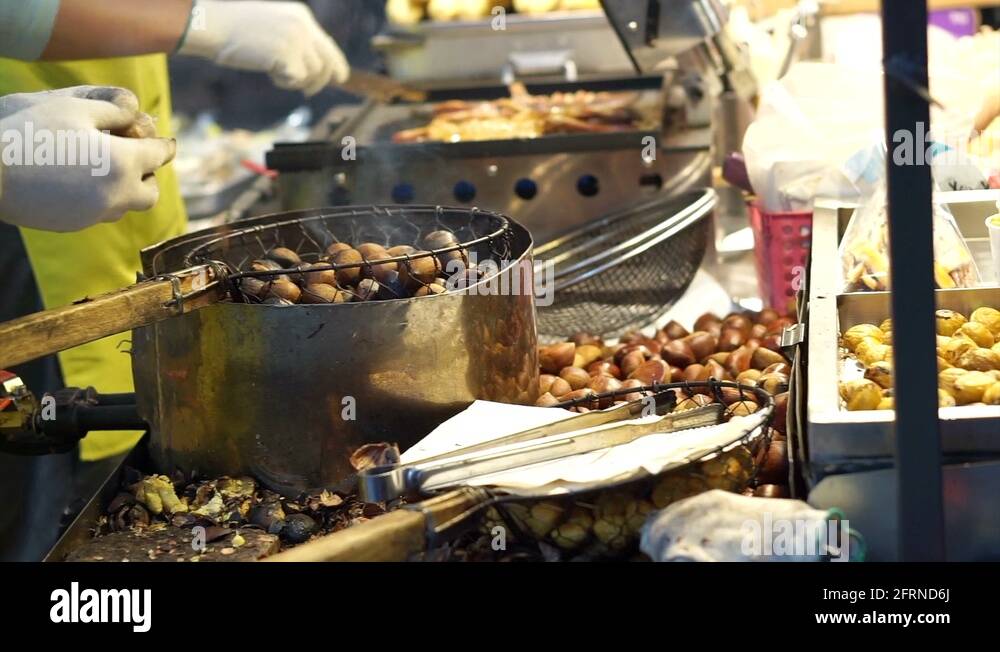 Roasted chestnut seller Stock Videos & Footage - HD and 4K Video Clips ...