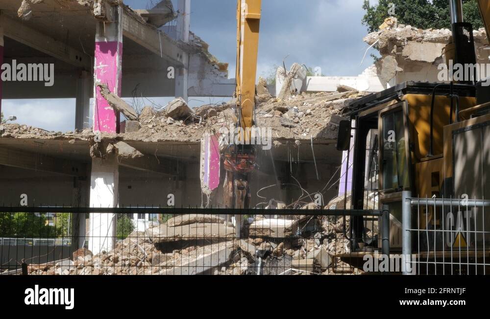 Building demolition with hydraulic excavator - 4K Ultra HD Stock Video ...