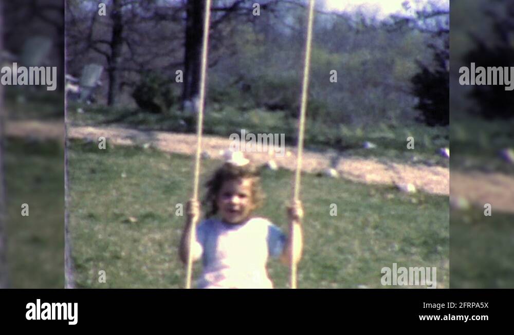 Kid on swing vintage Stock Videos & Footage - HD and 4K Video Clips - Alamy