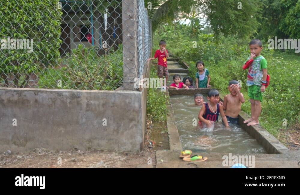 Children Bathe in Rice Field Canal in Village in Vietnam Stock Video ...