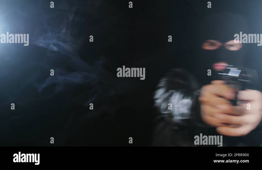 Masked man pointing gun Stock Videos & Footage - HD and 4K Video Clips ...