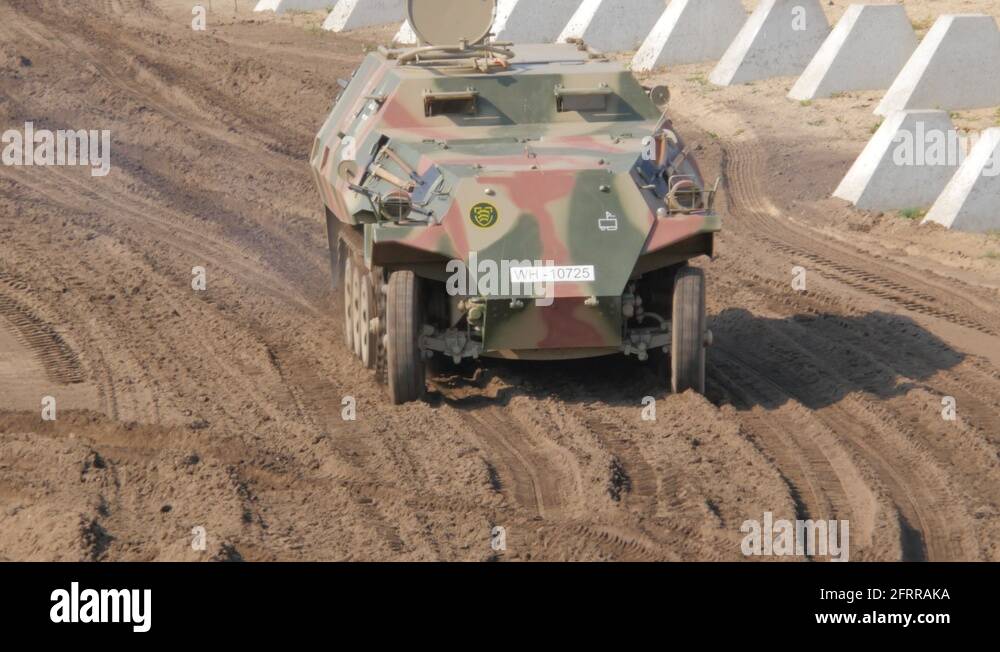 SDKFZ 251 OT German halftrack from World War II driving on the field ...