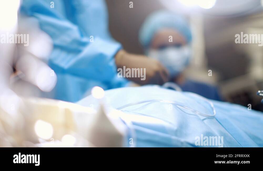 Operating room nurse handing Stock Videos & Footage - HD and 4K Video ...