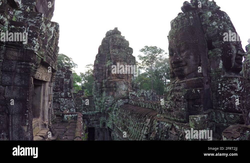 Ancient, Sculpted Stone Faces of Bayon Temple Ruin in Cambodia Stock ...