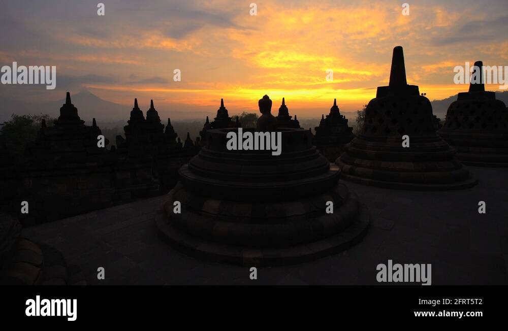Mt Merapi and Borobudur Hindu temple at sunrise Java Yogyakarta Stock ...