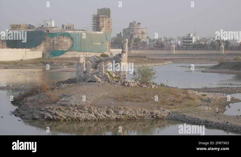 Ruins on island with Lakhota Museum in Ranmal lake,Jamnagar,India Stock ...
