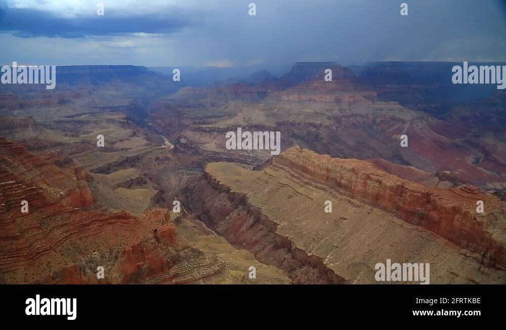 Colorado River, the Rock Layers and a Storm at the Grand Canyon Stock ...